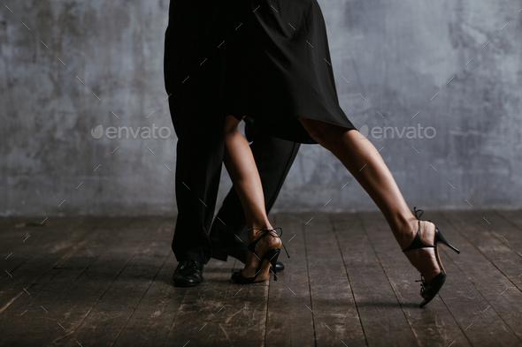 Man and woman in black dress dance tango Stock Photo by atercorv | PhotoDune